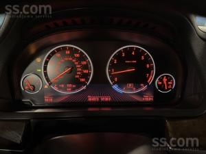 Black BMW 740 2013 in Riga, with an engine capacity of 3.00 L and mileage of 304 thousand km for 12750 €, photo 23 on AUTOMOTO.COM.LV