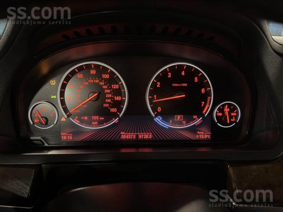 Black BMW 740 2013 in Riga, with an engine capacity of 3.00 L and mileage of 304 thousand km for 12750 €, photo 23 on AUTOMOTO.COM.LV