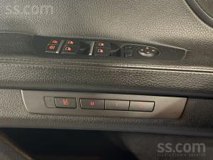 Black BMW 740 2013 in Riga, with an engine capacity of 3.00 L and mileage of 304 thousand km for 12750 €, photo 25 on AUTOMOTO.COM.LV
