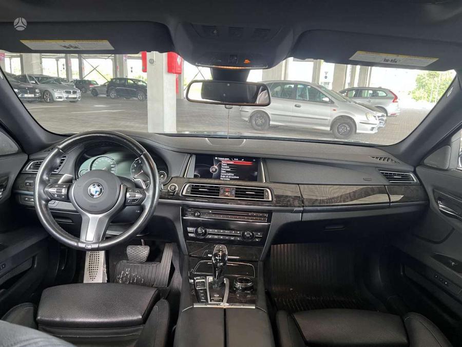 Black BMW 740 2014 in Vilnius, with an engine capacity of 3.00 L and mileage of 190 thousand km for 11000 €, photo 6 on AUTOMOTO.COM.LV