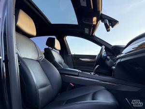 Black BMW 740 2015 in Vilnius, with an engine capacity of 3.00 L and mileage of 166 thousand km for 13500 €, photo 11 on AUTOMOTO.COM.LV