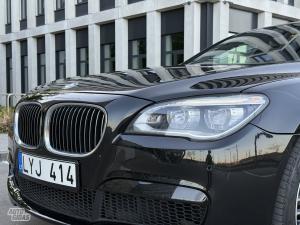 Black BMW 740 2015 in Vilnius, with an engine capacity of 3.00 L and mileage of 166 thousand km for 13500 €, photo 28 on AUTOMOTO.COM.LV