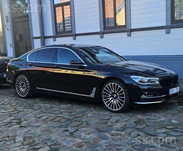 Black BMW 740 2015 in Jekabpils, with an engine capacity of 3.00 L and mileage of 220 thousand km for 26660 €, photo 1 on AUTOMOTO.COM.LV