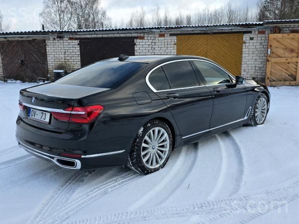 Black BMW 740 2015 in Jekabpils, with an engine capacity of 3.00 L and mileage of 220 thousand km for 26660 €, photo 6 on AUTOMOTO.COM.LV