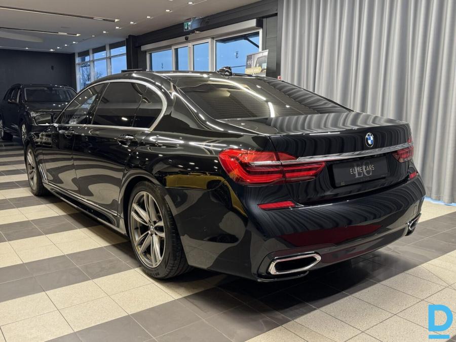 Black BMW 740 2016 in Marupe, with an engine capacity of 3.00 L and mileage of 161 thousand km for 32990 €, photo 4 on AUTOMOTO.COM.LV
