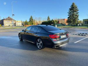 Black BMW 740 2016 in Silale, with an engine capacity of 3.00 L and mileage of 184 thousand km for 18850 €, photo 6 on AUTOMOTO.COM.LV