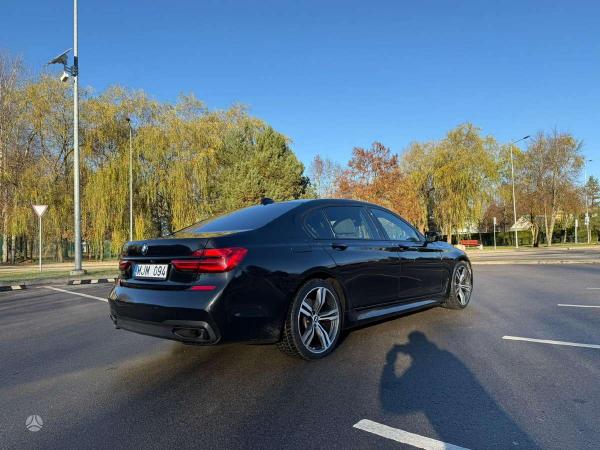 Black BMW 740 2016 in Silale, with an engine capacity of 3.00 L and mileage of 184 thousand km for 18850 €, photo 9 on AUTOMOTO.COM.LV