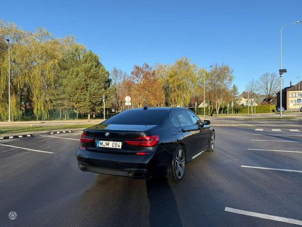 Black BMW 740 2016 in Silale, with an engine capacity of 3.00 L and mileage of 184 thousand km for 18850 €, photo 10 on AUTOMOTO.COM.LV