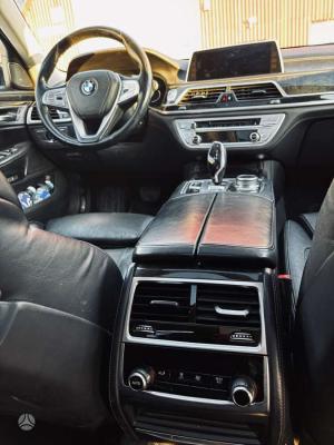 Black BMW 740 2016 in Vilnius, with an engine capacity of 3.00 L and mileage of 224 thousand km for 27500 €, photo 7 on AUTOMOTO.COM.LV