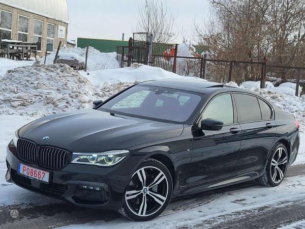 Black BMW 740 2016 in Vilnius, with an engine capacity of 2.99 L and mileage of 286 thousand km for 26500 €, photo 2 on AUTOMOTO.COM.LV