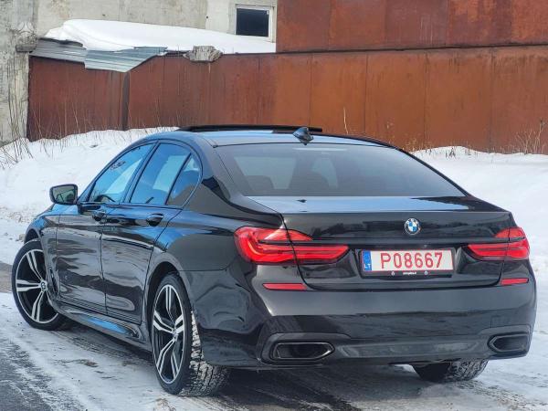 Black BMW 740 2016 in Vilnius, with an engine capacity of 2.99 L and mileage of 286 thousand km for 26500 €, photo 10 on AUTOMOTO.COM.LV