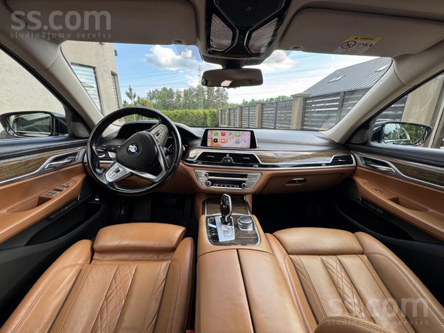 Black BMW 740 2016 in Riga, with an engine capacity of 3.00 L and mileage of 227 thousand km for 26200 €, photo 6 on AUTOMOTO.COM.LV