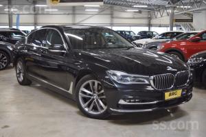 Black BMW 740 2016 in Riga, with an engine capacity of 3.00 L and mileage of 236 thousand km for 24900 €, photo  on AUTOMOTO.COM.LV
