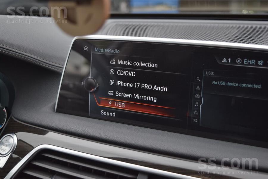 Black BMW 740 2016 in Riga, with an engine capacity of 3.00 L and mileage of 236 thousand km for 24900 €, photo 11 on AUTOMOTO.COM.LV