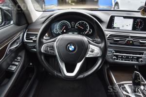 Black BMW 740 2016 in Riga, with an engine capacity of 3.00 L and mileage of 236 thousand km for 24900 €, photo 13 on AUTOMOTO.COM.LV