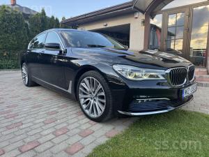 Black BMW 740 2016 in Riga, with an engine capacity of 3.00 L and mileage of 227 thousand km for 26200 €, photo  on AUTOMOTO.COM.LV