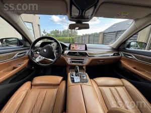 Black BMW 740 2016 in Riga, with an engine capacity of 3.00 L and mileage of 227 thousand km for 26200 €, photo 6 on AUTOMOTO.COM.LV