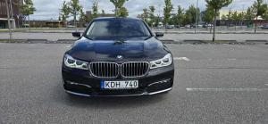 Black BMW 740 2016 in Klaipeda, with an engine capacity of 2.99 L and mileage of 218 thousand km for 25500 €, photo  on AUTOMOTO.COM.LV