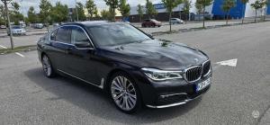Black BMW 740 2016 in Klaipeda, with an engine capacity of 2.99 L and mileage of 218 thousand km for 25500 €, photo 4 on AUTOMOTO.COM.LV