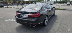 Black BMW 740 2016 in Klaipeda, with an engine capacity of 2.99 L and mileage of 218 thousand km for 25500 €, photo 6 on AUTOMOTO.COM.LV