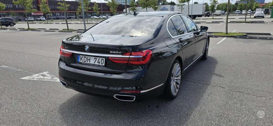 Black BMW 740 2016 in Klaipeda, with an engine capacity of 2.99 L and mileage of 218 thousand km for 25500 €, photo 6 on AUTOMOTO.COM.LV