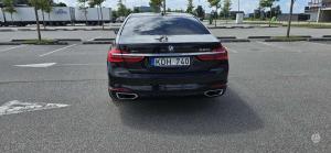 Black BMW 740 2016 in Klaipeda, with an engine capacity of 2.99 L and mileage of 218 thousand km for 25500 €, photo 7 on AUTOMOTO.COM.LV