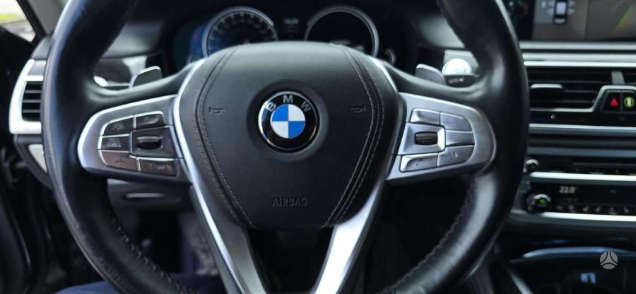 Black BMW 740 2016 in Klaipeda, with an engine capacity of 2.99 L and mileage of 218 thousand km for 25500 €, photo 14 on AUTOMOTO.COM.LV