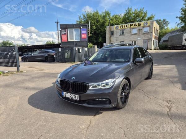 Black BMW 740 2016 in Riga, with an engine capacity of 3.00 L and mileage of 315 thousand km for 20490 €, photo 1 on AUTOMOTO.COM.LV