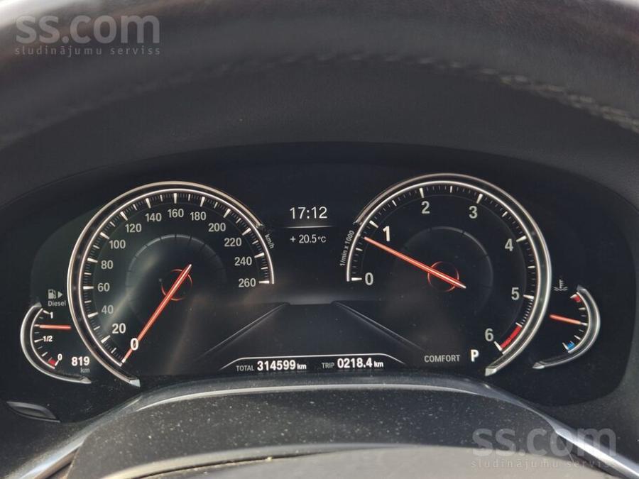 Black BMW 740 2016 in Riga, with an engine capacity of 3.00 L and mileage of 315 thousand km for 20490 €, photo 13 on AUTOMOTO.COM.LV