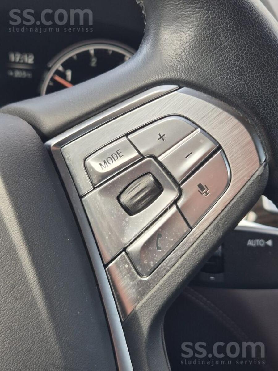 Black BMW 740 2016 in Riga, with an engine capacity of 3.00 L and mileage of 315 thousand km for 20490 €, photo 16 on AUTOMOTO.COM.LV
