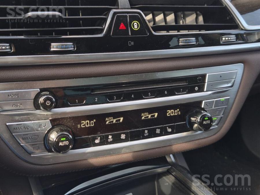 Black BMW 740 2016 in Riga, with an engine capacity of 3.00 L and mileage of 315 thousand km for 20490 €, photo 21 on AUTOMOTO.COM.LV