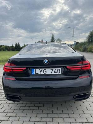 Black BMW 740 2016 in Klaipeda, with an engine capacity of 3.00 L and mileage of 148 thousand km for 20750 €, photo 6 on AUTOMOTO.COM.LV