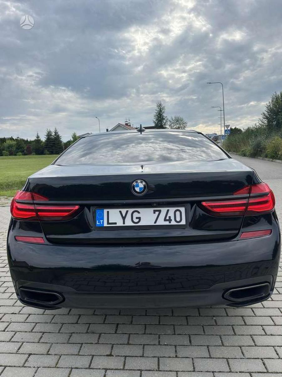Black BMW 740 2016 in Klaipeda, with an engine capacity of 3.00 L and mileage of 148 thousand km for 20750 €, photo 6 on AUTOMOTO.COM.LV