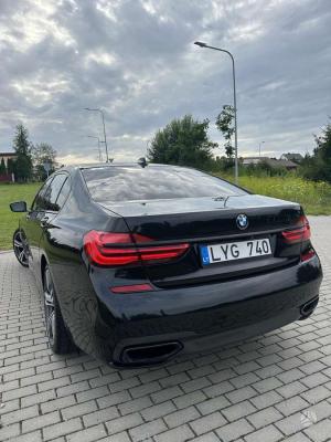 Black BMW 740 2016 in Klaipeda, with an engine capacity of 3.00 L and mileage of 148 thousand km for 20750 €, photo 7 on AUTOMOTO.COM.LV