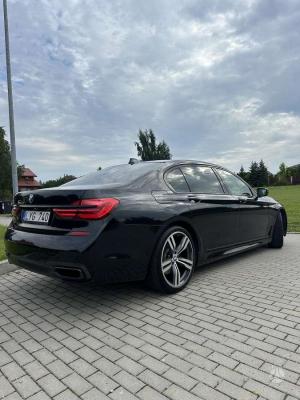 Black BMW 740 2016 in Klaipeda, with an engine capacity of 3.00 L and mileage of 148 thousand km for 20750 €, photo 8 on AUTOMOTO.COM.LV