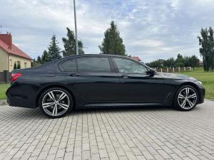 Black BMW 740 2016 in Klaipeda, with an engine capacity of 3.00 L and mileage of 148 thousand km for 20750 €, photo 9 on AUTOMOTO.COM.LV