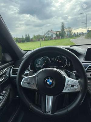 Black BMW 740 2016 in Klaipeda, with an engine capacity of 3.00 L and mileage of 148 thousand km for 20750 €, photo 12 on AUTOMOTO.COM.LV