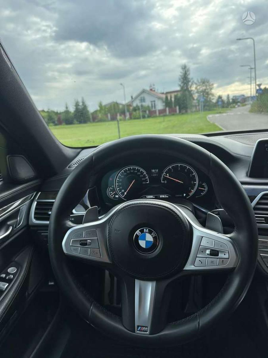 Black BMW 740 2016 in Klaipeda, with an engine capacity of 3.00 L and mileage of 148 thousand km for 20750 €, photo 12 on AUTOMOTO.COM.LV