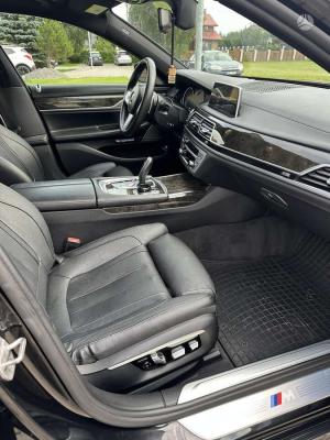 Black BMW 740 2016 in Klaipeda, with an engine capacity of 3.00 L and mileage of 148 thousand km for 20750 €, photo 17 on AUTOMOTO.COM.LV