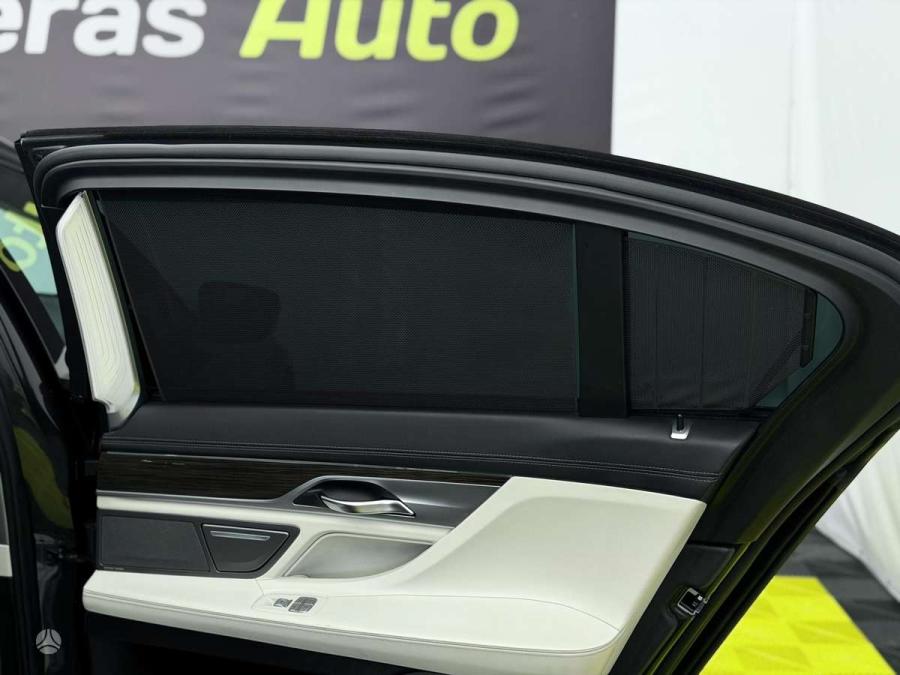 Black BMW 740 2016 in Vilnius, with an engine capacity of 3.00 L and mileage of 80 thousand km for 23300 €, photo 23 on AUTOMOTO.COM.LV