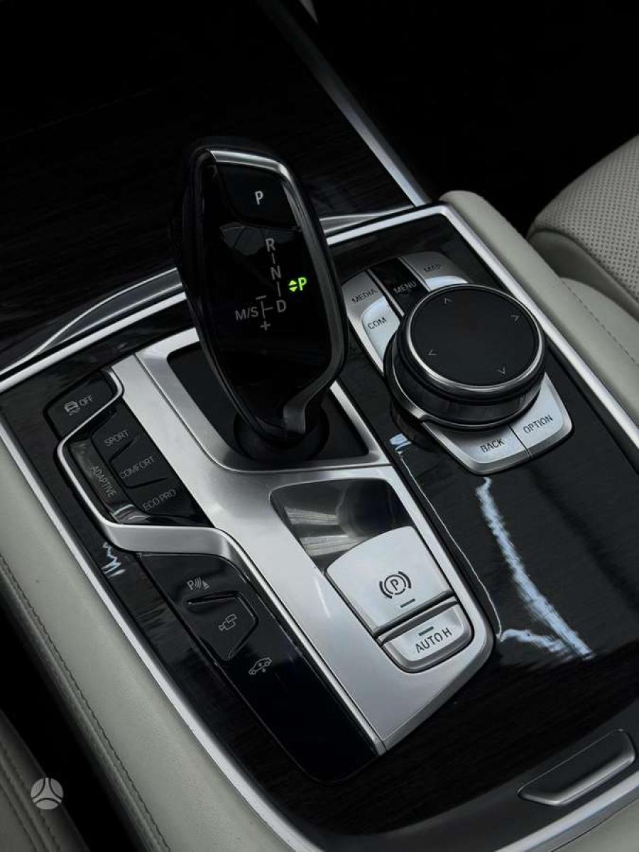 Black BMW 740 2016 in Vilnius, with an engine capacity of 3.00 L and mileage of 80 thousand km for 23300 €, photo 28 on AUTOMOTO.COM.LV
