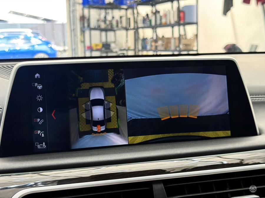 Black BMW 740 2016 in Vilnius, with an engine capacity of 3.00 L and mileage of 80 thousand km for 23300 €, photo 32 on AUTOMOTO.COM.LV