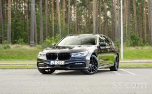 Black BMW 740 2016 in Riga, with an engine capacity of 3.00 L and mileage of 315 thousand km for 20490 €, photo  on AUTOMOTO.COM.LV