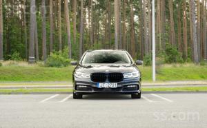 Black BMW 740 2016 in Riga, with an engine capacity of 3.00 L and mileage of 315 thousand km for 20490 €, photo 4 on AUTOMOTO.COM.LV