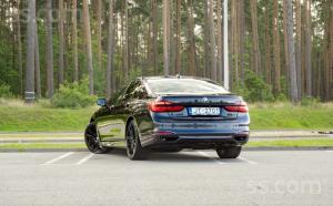Black BMW 740 2016 in Riga, with an engine capacity of 3.00 L and mileage of 315 thousand km for 20490 €, photo 9 on AUTOMOTO.COM.LV