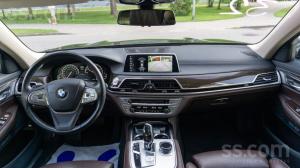 Black BMW 740 2016 in Riga, with an engine capacity of 3.00 L and mileage of 315 thousand km for 20490 €, photo 13 on AUTOMOTO.COM.LV