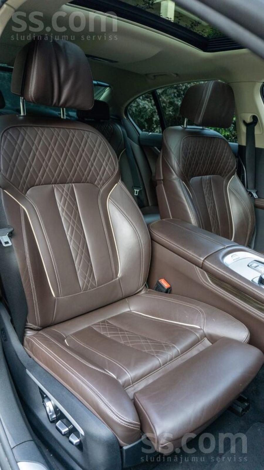 Black BMW 740 2016 in Riga, with an engine capacity of 3.00 L and mileage of 315 thousand km for 20490 €, photo 30 on AUTOMOTO.COM.LV