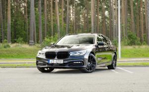 Black BMW 740 2016 in Riga, with an engine capacity of 3.00 L and mileage of 315 thousand km for 19590 €, photo  on AUTOMOTO.COM.LV