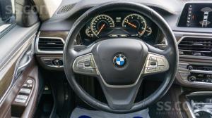Black BMW 740 2016 in Riga, with an engine capacity of 3.00 L and mileage of 315 thousand km for 18590 €, photo 14 on AUTOMOTO.COM.LV