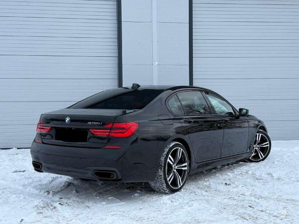 Black BMW 740 2017 in Mazeikiai, with an engine capacity of 3.00 L and mileage of 150 thousand km for 29999 €, photo 5 on AUTOMOTO.COM.LV